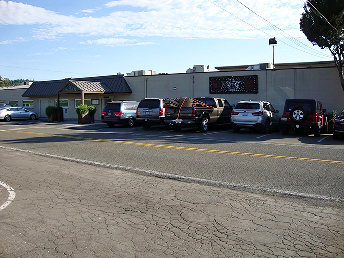 The parking lot tells the story – vehicles from near and far converge on this culinary landmark like moths to a flame.