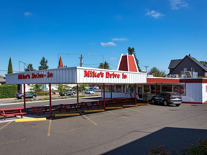 The classic A-frame silhouette of Mike's Drive-In stands as a monument to American road food done absolutely right.