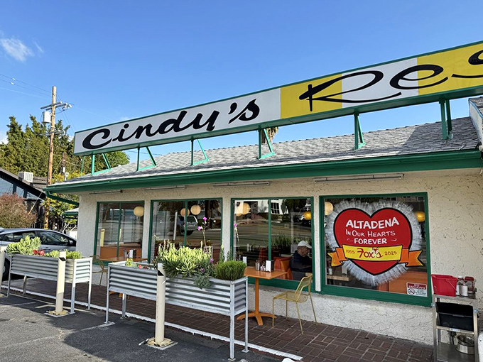 The exterior view reveals Cindy's local heart with its "Altadena In Our Hearts Forever" sign&mdash;a neighborhood treasure serving up memories.