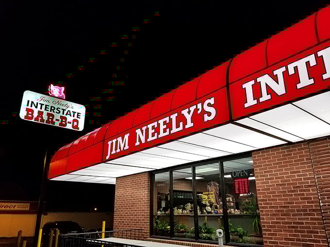 At night, that neon sign transforms into a lighthouse, guiding barbecue pilgrims safely to port through a sea of lesser dining options.