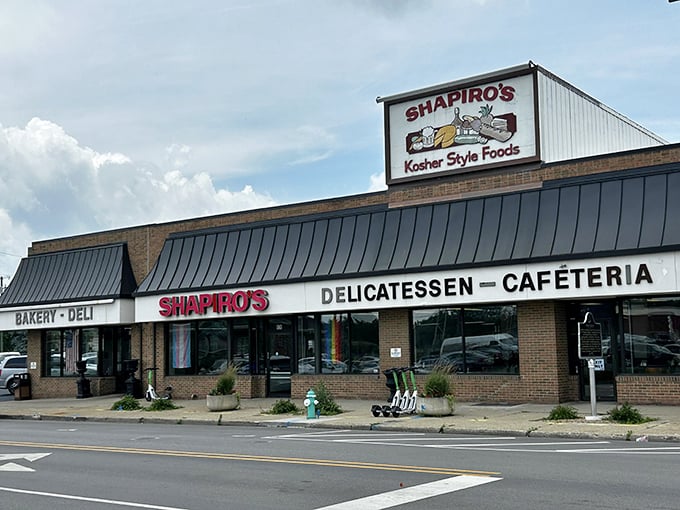 The exterior view that promises comfort within. That sign proudly declaring "Kosher Style Foods" has been a beacon for hungry Hoosiers through rain, shine, and everything between.