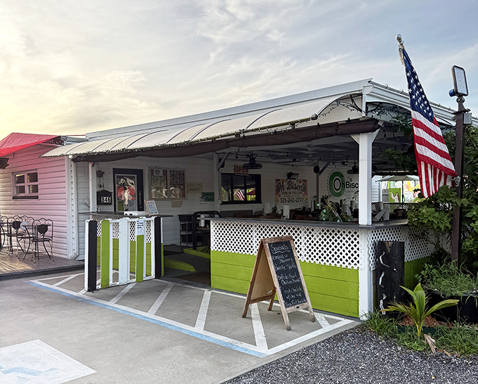 The cheerful exterior with its American flag welcomes hungry visitors. That lime green accent says "we're serious about food, not decor."