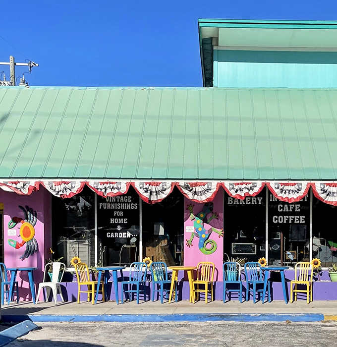 The mint-green roof and festive awning create the perfect frame for whimsical murals, like a children's book illustration come to delicious life.
