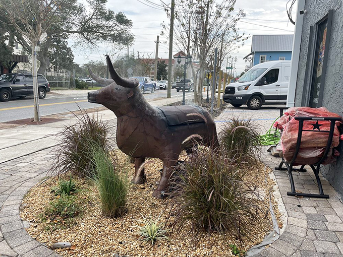 The metal bull stands guard outside, a fitting sentinel for a place that takes its beef very, very seriously.