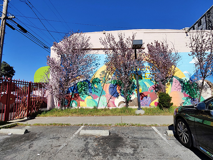 Spring blossoms complement the colorful mural behind the store &ndash; a hidden pocket of beauty in the urban landscape of San Francisco.