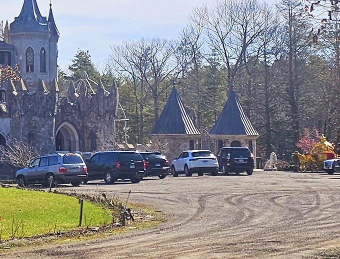 Even the parking area maintains the medieval charm. Stone walls and turrets greet visitors before they've even turned off their engines.