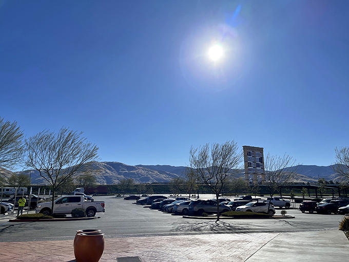 Mountain vistas frame endless parking possibilities, where finding your car becomes easier than finding the perfect discounted designer shoes.