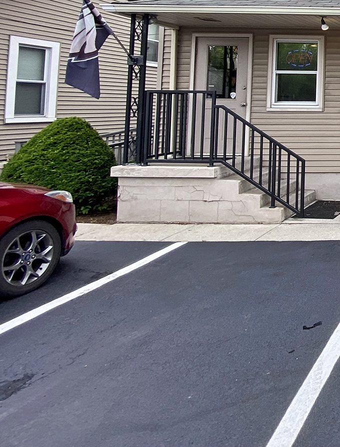 The modest entrance and parking area &ndash; your first clue that this place prioritizes substance over style.