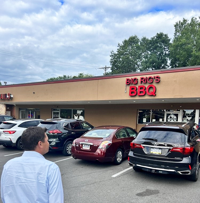 A parking lot filled with cars of barbecue pilgrims. When you see a full lot at a strip mall restaurant, you know you've found something special.