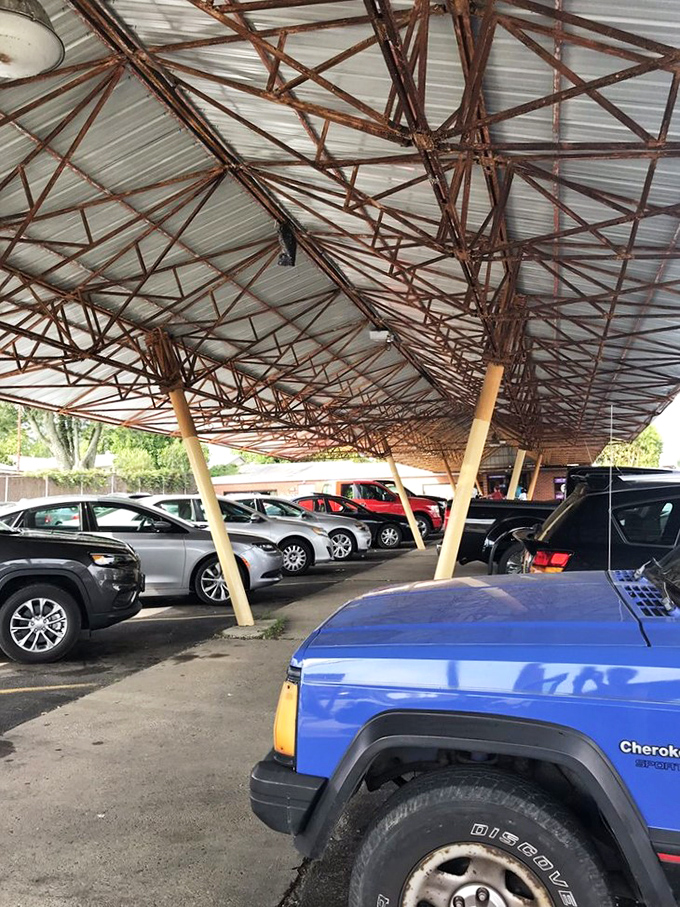 That covered parking area isn't just practical - it's a promise that some things in this world are still designed with actual humans in mind.