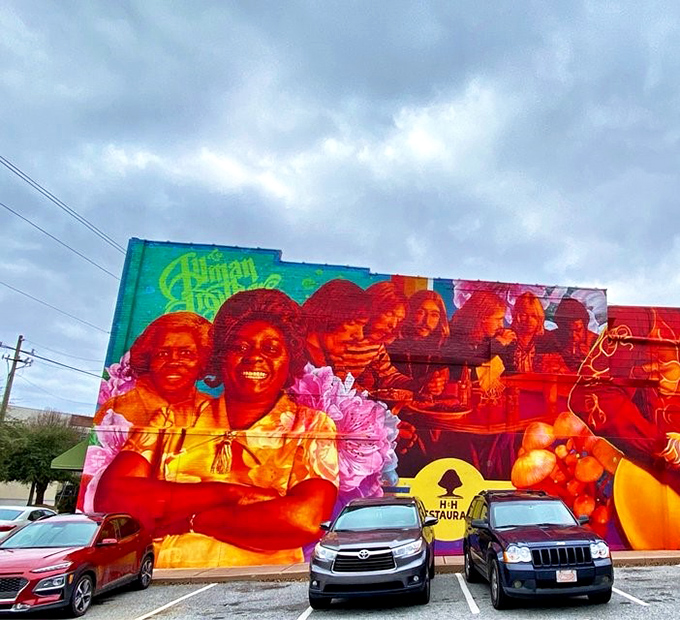 The parking lot view of that magnificent mural reminds you: this isn't just a meal stop&mdash;it's a pilgrimage destination for food lovers.
