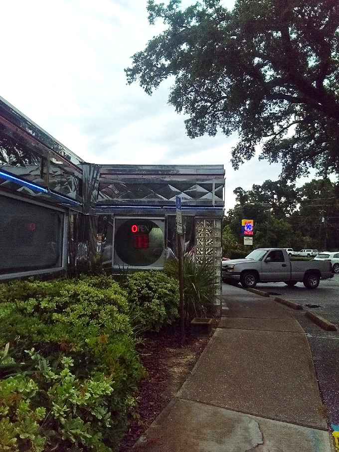 Even on cloudy days, this diner shines like a beacon for hungry travelers and locals alike. Your stomach is already thanking you.
