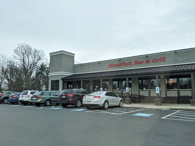 A parking lot that fills with the precision of a Swiss watch during peak hours. The mix of vehicles tells the story of Home Town's universal appeal.