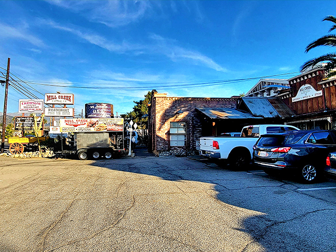Even the parking lot tells a story, with vintage wagons and Western props that set the stage for the feast that awaits inside.
