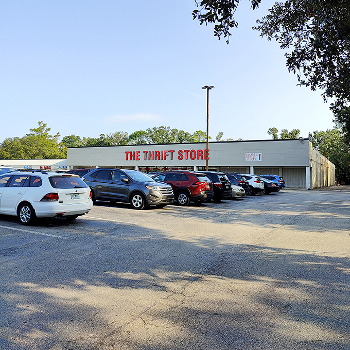 The unassuming entrance to a world of possibilities. Cars wait patiently while their owners lose track of time inside this secondhand paradise. 