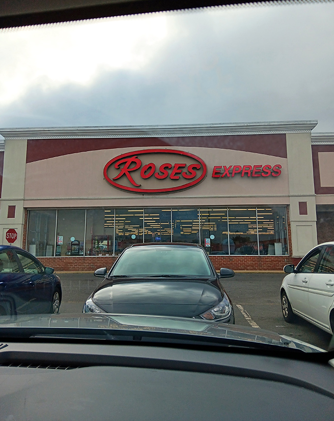 The red sign glows like a beacon of bargains against cloudy skies&mdash;a siren call to Delaware shoppers seeking retail therapy without financial regret.