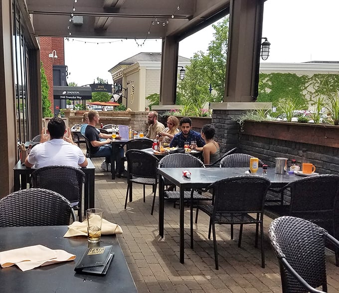 The patio: where fresh air meets fresh food, and strangers become friends over shared condiments.