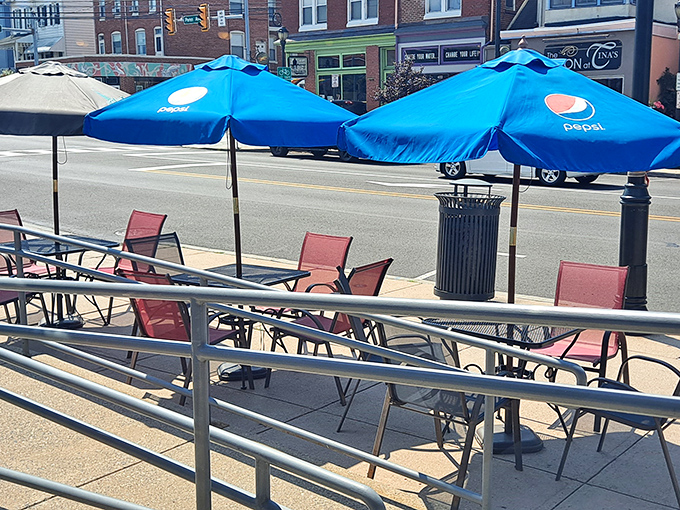 The street-side patio offers front-row seats to West Reading's daily parade of life, where every passerby is just a friendly hello away from becoming part of the story.