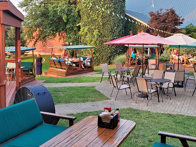 Outdoor dining that captures Michigan summer perfection. These shaded nooks are where memories are made, one bite at a time.