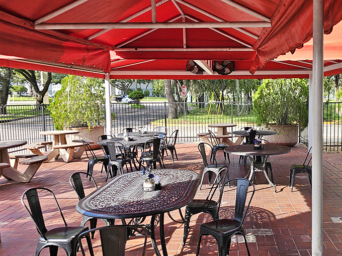 The outdoor patio offers a breezy Florida dining experience, though most folks are too focused on their seafood to notice the scenery.