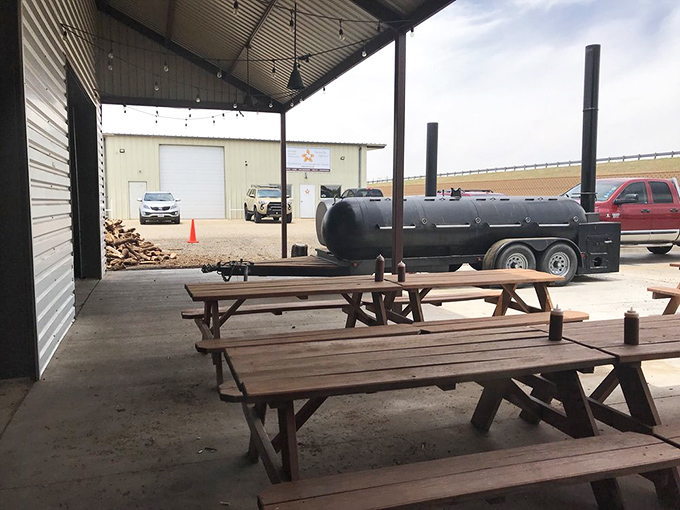 The outdoor sanctuary where picnic tables await those who prefer their brisket with a side of fresh Texas air.