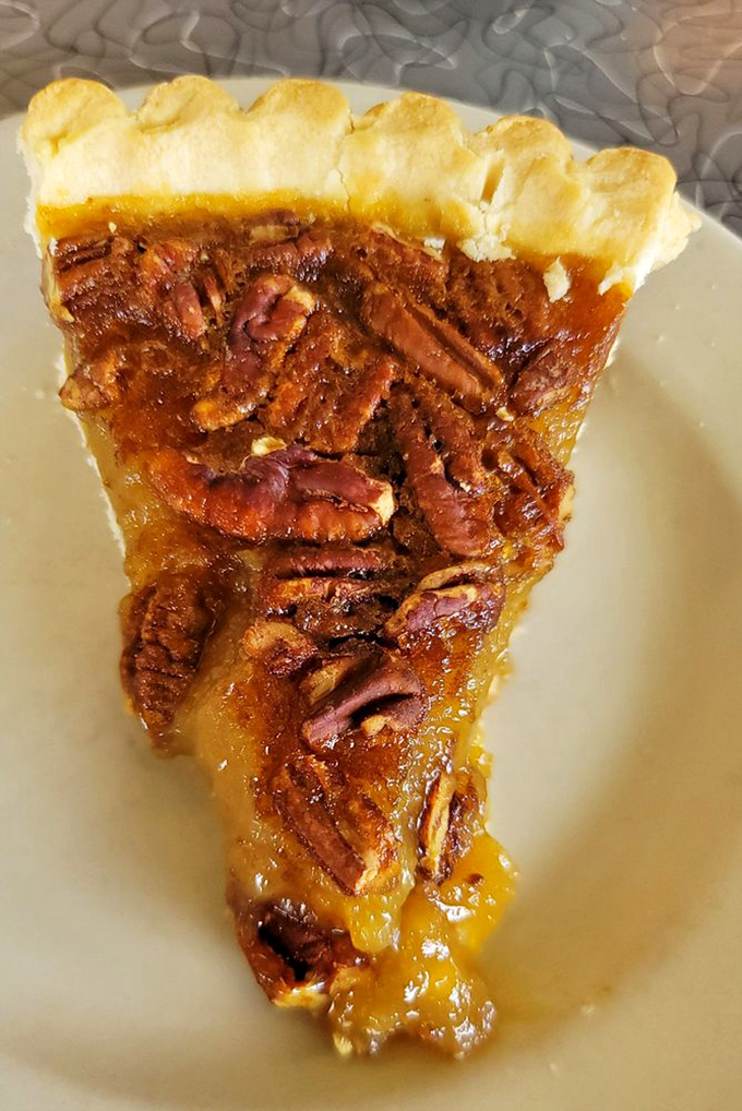 Pecan pie that makes you wonder why anyone bothers with birthday cake &ndash; sweet, gooey, nutty perfection on a plate.