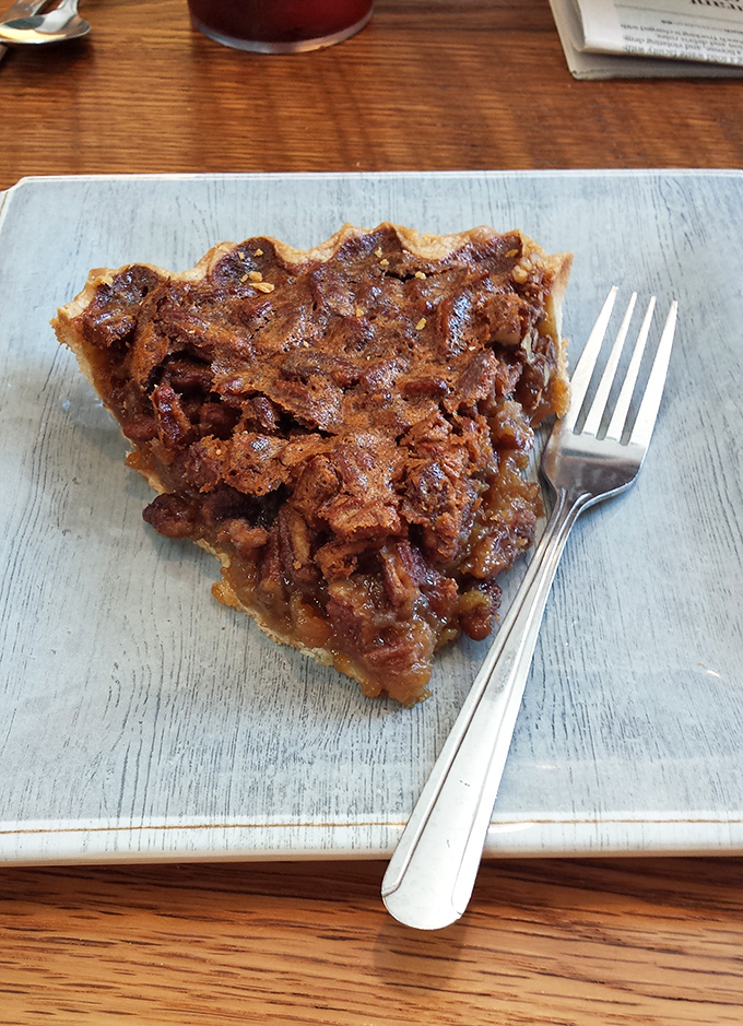 Pecan pie so dense with nuts it could sink a small boat. That gooey filling is what dessert dreams are made of.