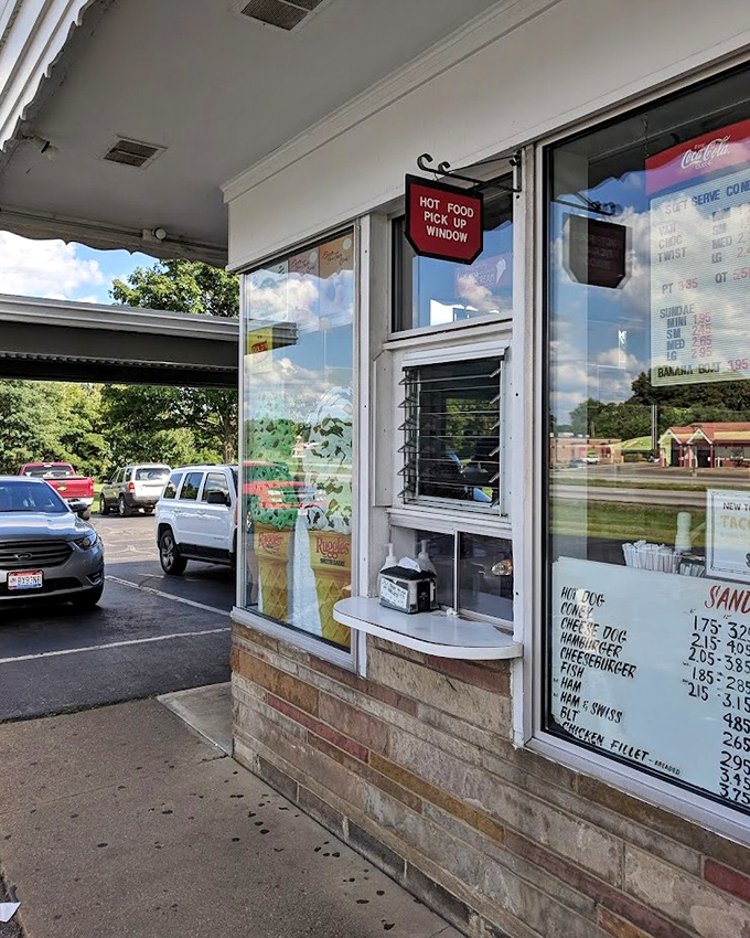 The pick-up window&mdash;where summer memories are handed out in paper wrappers and plastic cups, one order at a time.