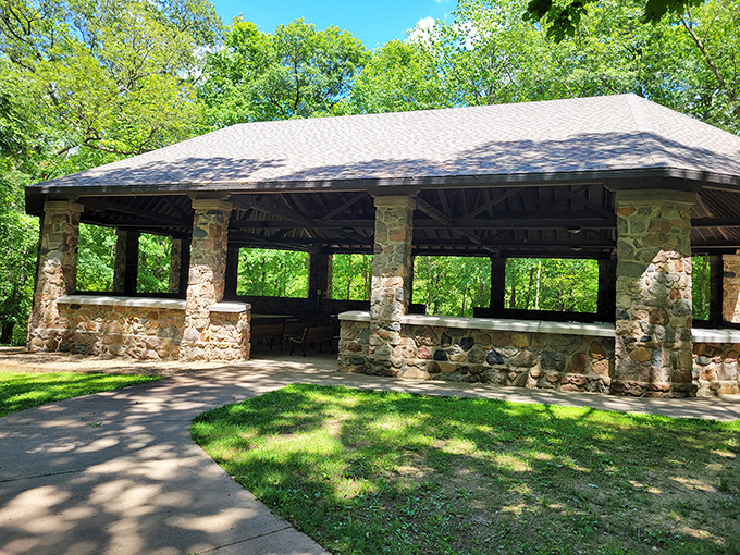 Picnic shelter architecture that proves functional can be beautiful when nature provides the perfect backdrop. 