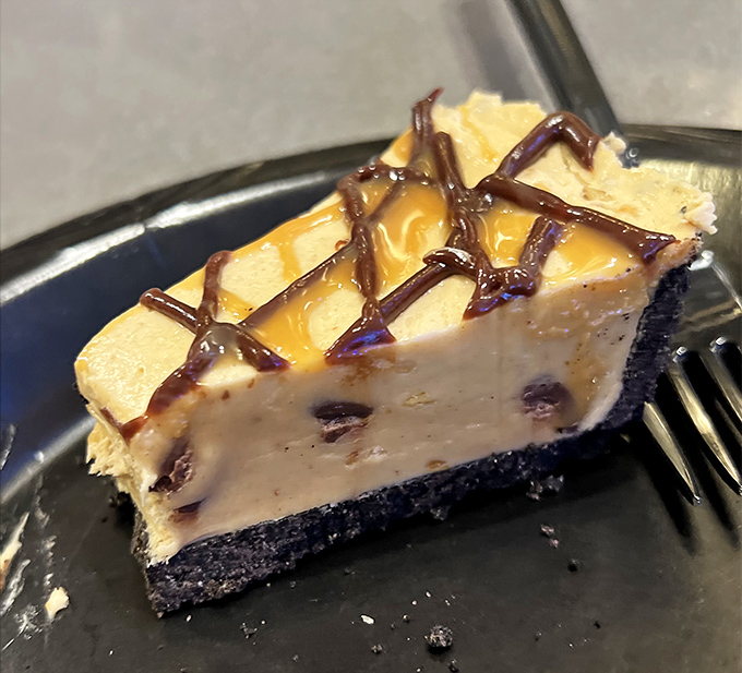 Key lime pie's sophisticated cousin – a creamy, chocolate-drizzled slice that makes you wonder why you'd ever waste calories on ordinary dessert.