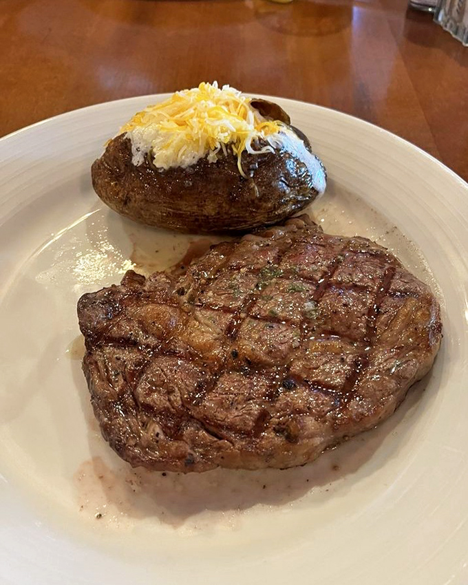A rare ribeye that's blushing not from modesty, but from being cooked to that perfect sweet spot between "moo" and "well done."
