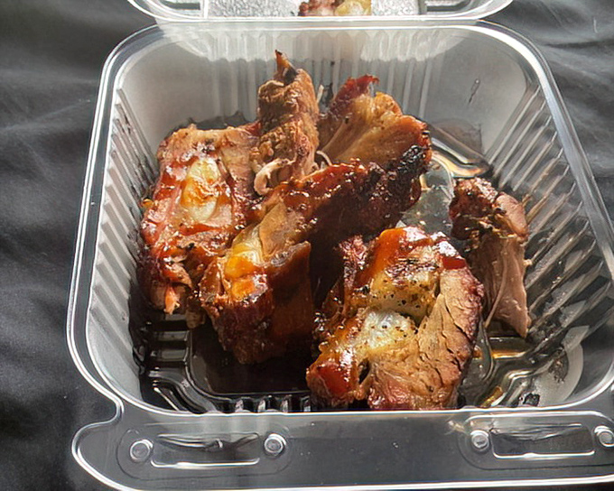 Rib tips glistening with sauce &ndash; the kind of dish that makes you thankful for whoever invented wet wipes and not care who's watching you eat.