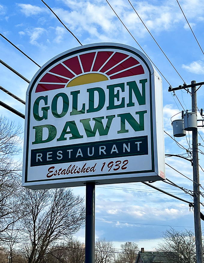 This isn't just a sign; it's a landmark guiding hungry travelers home. Standing tall against the Ohio sky, promising comfort food that delivers on every syllable.