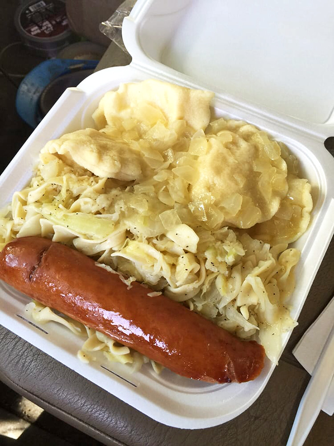 The holy trinity of Pittsburgh comfort: sausage, noodles, and pierogies creating pure carbohydrate bliss.
