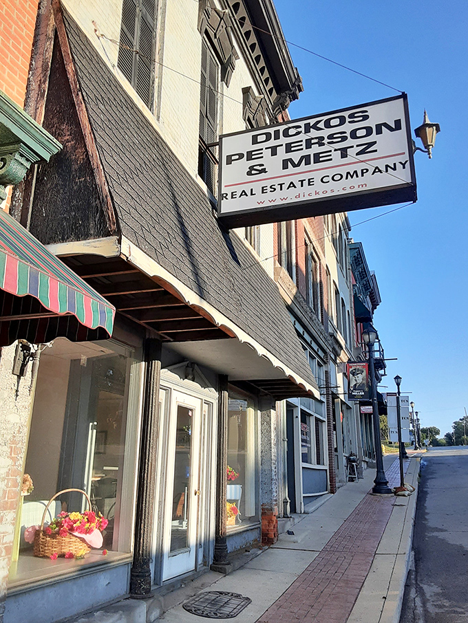 Sidewalks lined with historic storefronts invite window shopping and spontaneous conversations, where "running a quick errand" might take all afternoon.