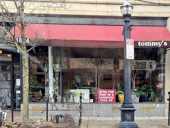 Even during challenging times, that familiar red awning signals that some comforts remain steadfast and ready to welcome you home.