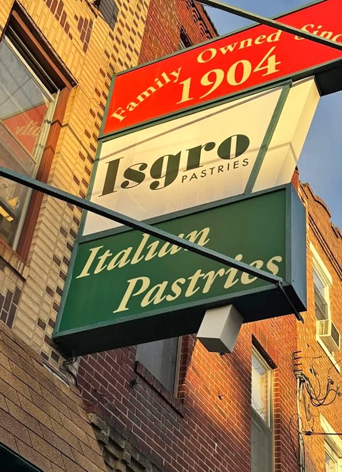 The sign glows like a beacon of hope in Philadelphia's Italian Market, promising sweet salvation to all who enter beneath it.