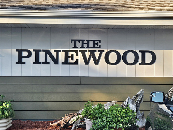 The sign says "Pinewood" but might as well read "You've Arrived"&mdash;the gateway to a Wisconsin dining institution where hunger goes to surrender.