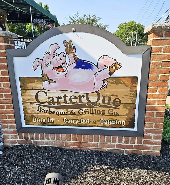 The playful pig sign welcomes hungry visitors &ndash; a whimsical guardian announcing you've arrived at a place that takes fun seriously.