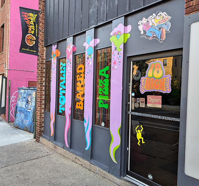 The fa&ccedil;ade that launched a thousand munchies. That "18 HIGH ST" sign isn't just an address&mdash;it's practically truth in advertising for this elevated pizza experience.