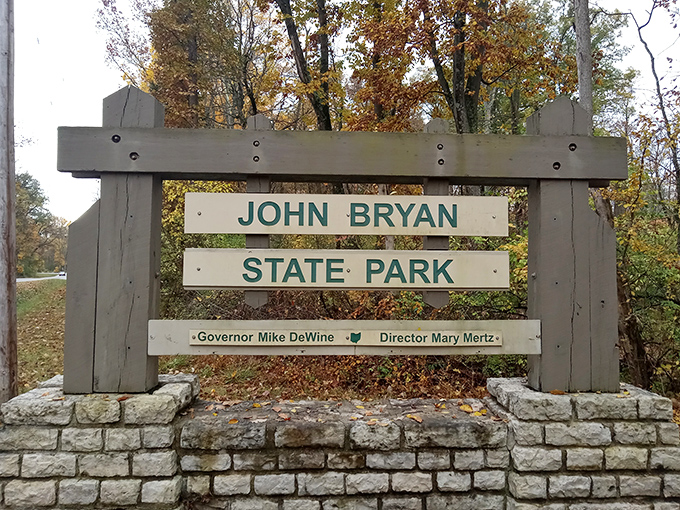 The park entrance sign offers no spoilers about the natural wonders waiting beyond. Some treasures you have to discover yourself.
