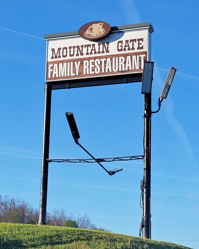 The roadside sign stands as a beacon of hope for hungry travelers&mdash;like a lighthouse, but instead of avoiding rocks, you're steering toward rolls.