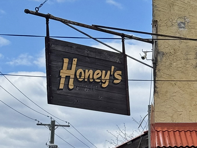 The sign swinging gently in the Philadelphia breeze – a beacon of breakfast hope for hungry travelers and locals alike.