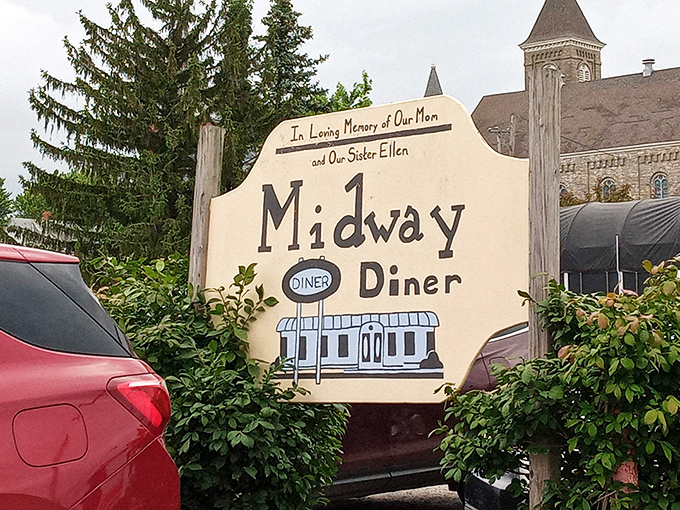 In Loving Memory says it all—this isn't just a restaurant, it's a legacy. The Midway sign stands as a monument to family traditions and community connections.