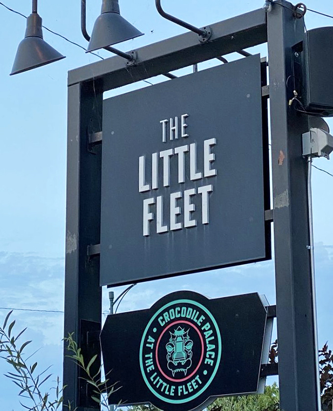 That sign isn't just marking a location&mdash;it's a beacon for food lovers, promising culinary adventure behind its unassuming exterior.