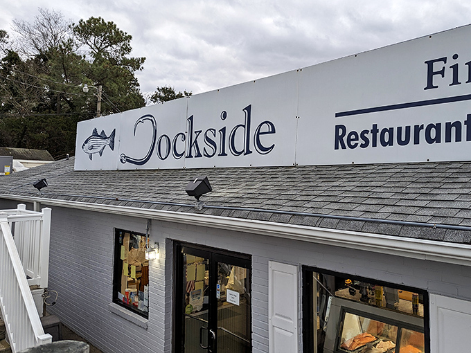 The sign promises three experiences in one – restaurant, seafood market, and fishing center – a coastal trifecta that delivers on all fronts.