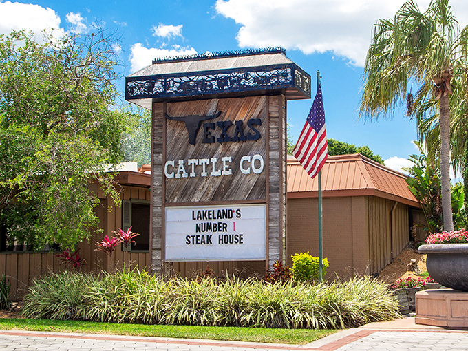 "Lakeland's Number 1 Steak House" proclaims the sign, surrounded by tropical landscaping. Where Texas tradition meets Florida charm in delicious harmony.