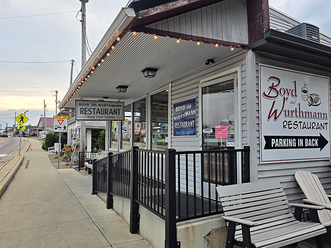 Small-town charm with string lights that say, "Yes, we're worth the drive." The bench outside is for contemplating your pie choices.
