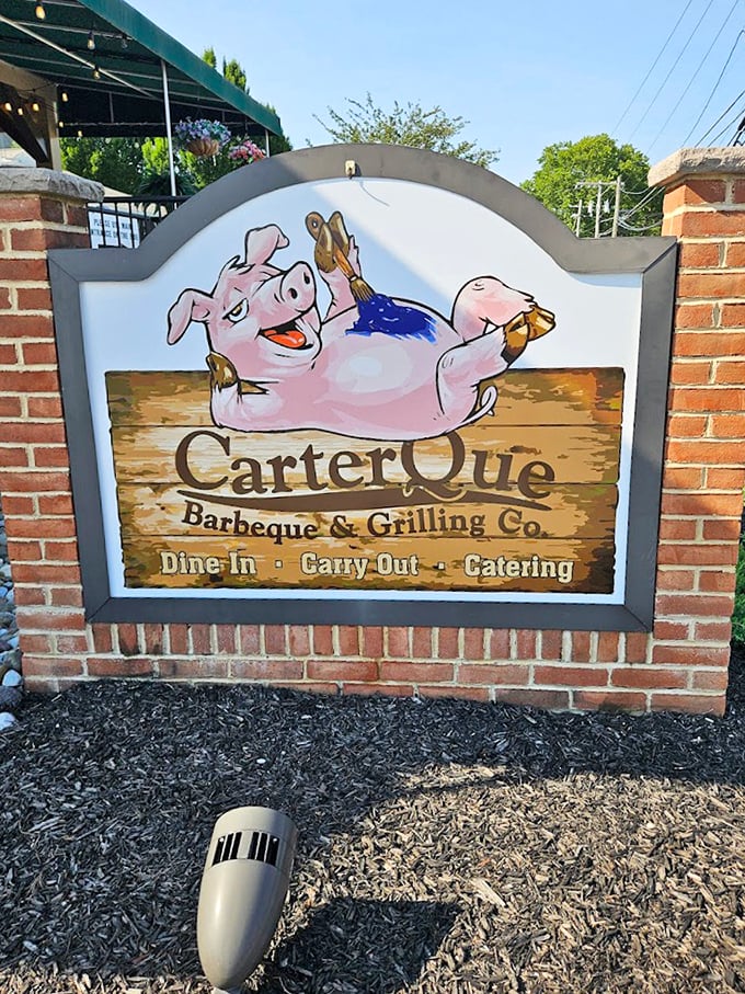 A sign featuring a happy pig might seem ironic at a barbecue joint, but it's actually truth in advertising – these folks know their pork.