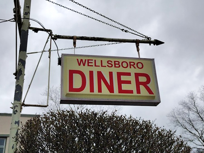 The sign says it all—simple, straightforward, and promising exactly what you want: a genuine diner experience without pretense or gimmicks, just good food and warm welcome.